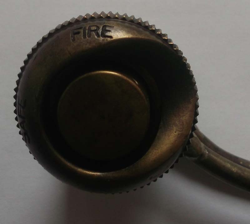 In good condition and working order the button depresses and the safety ...